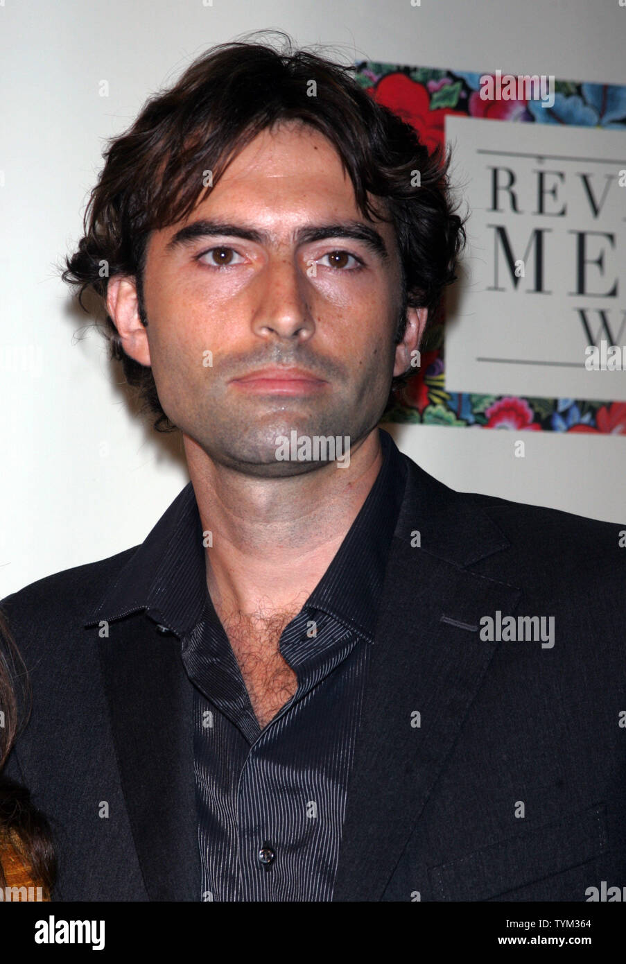 John C. Mack arrives for the opening night reception for "Revealing ...