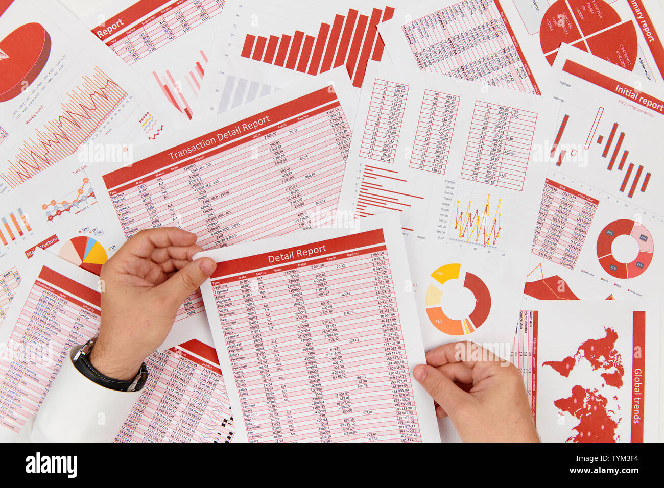 Business reports, data tables and charts - directly above view of ...