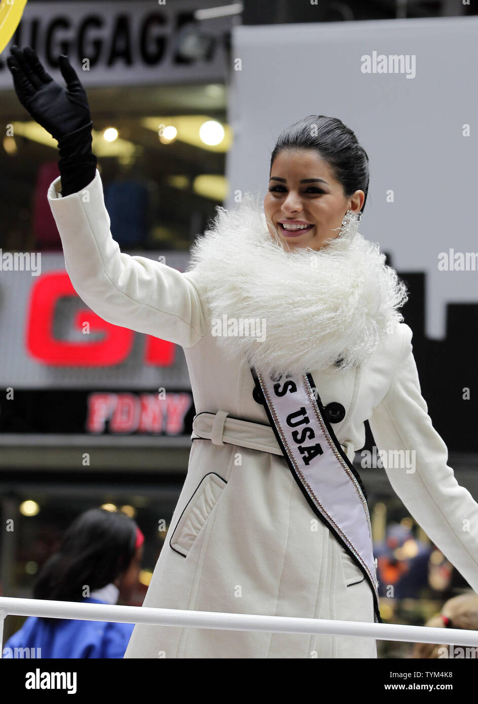 Miss USA Rima Fakih rides down the parade route on a float at the Macy ...