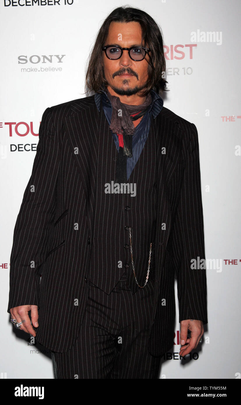 Johnny Depp arrives for "The Tourist" Premiere at the Ziegfeld Theater ...