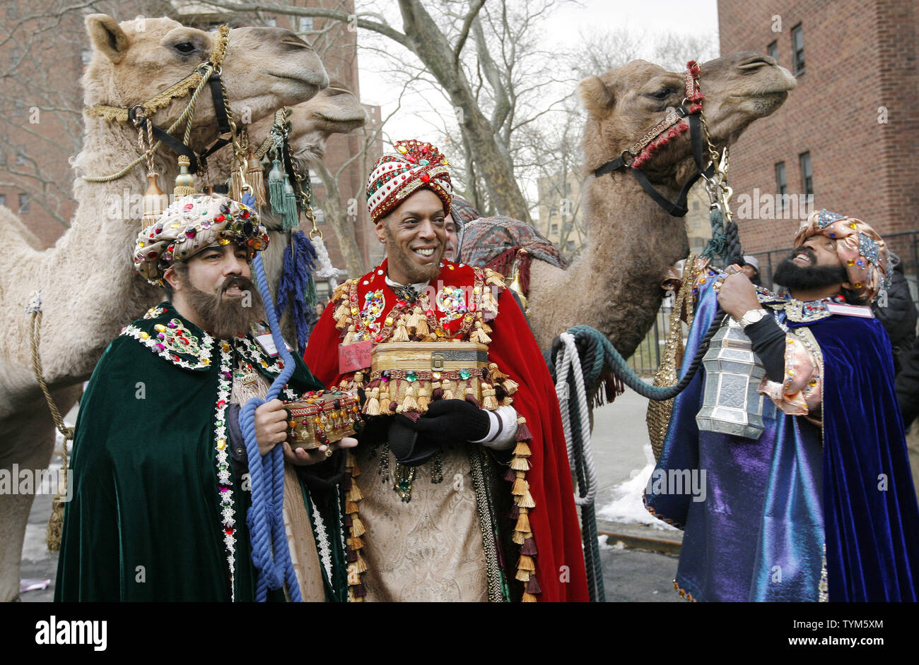 Marcus Luna (L), dressed as King Balthazar, Marcus Sanchez, center, as ...