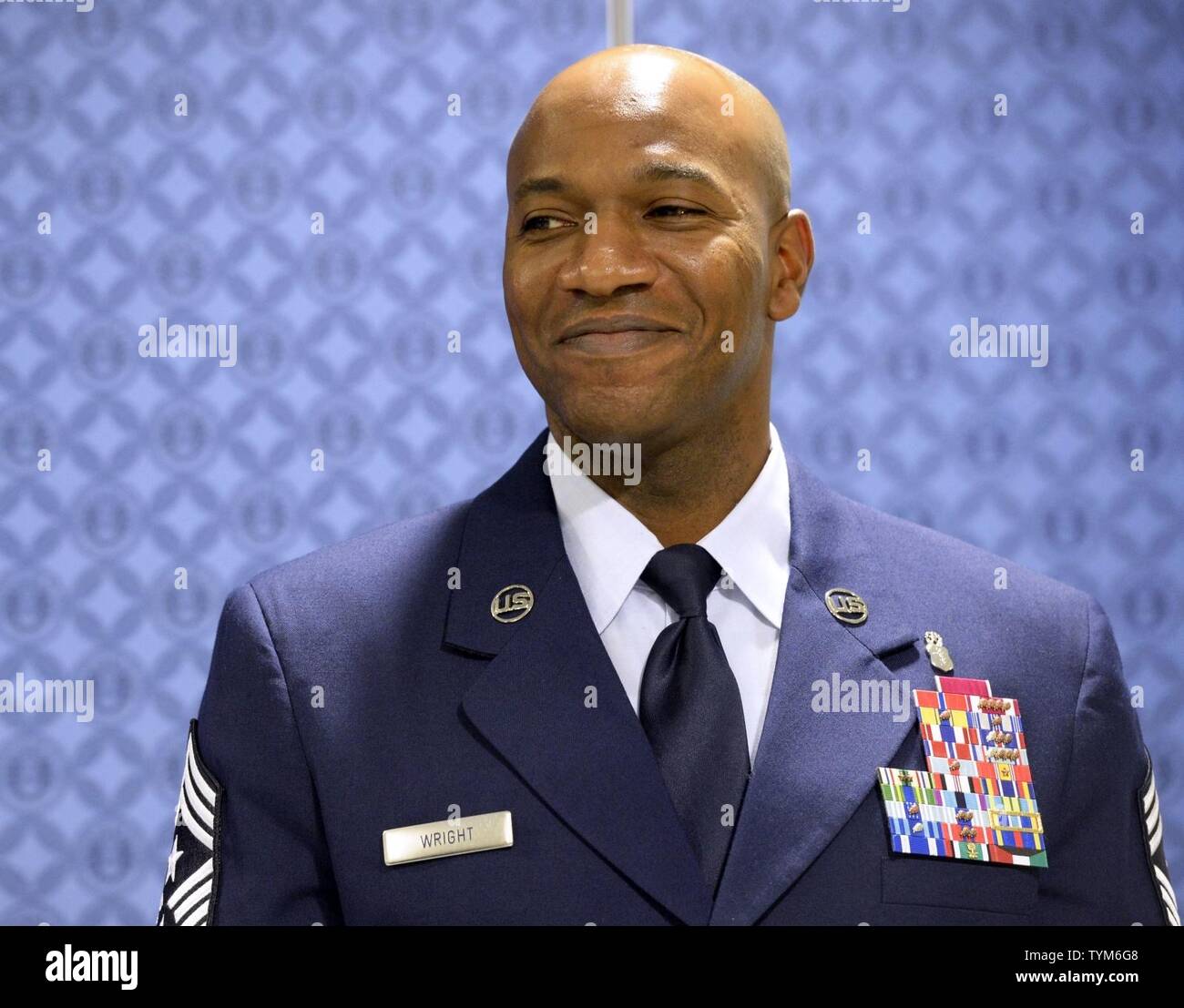 Chief Master Sgt. Kaleth O. Wright smiles after being named the 18th Chief Master Sergeant of ...