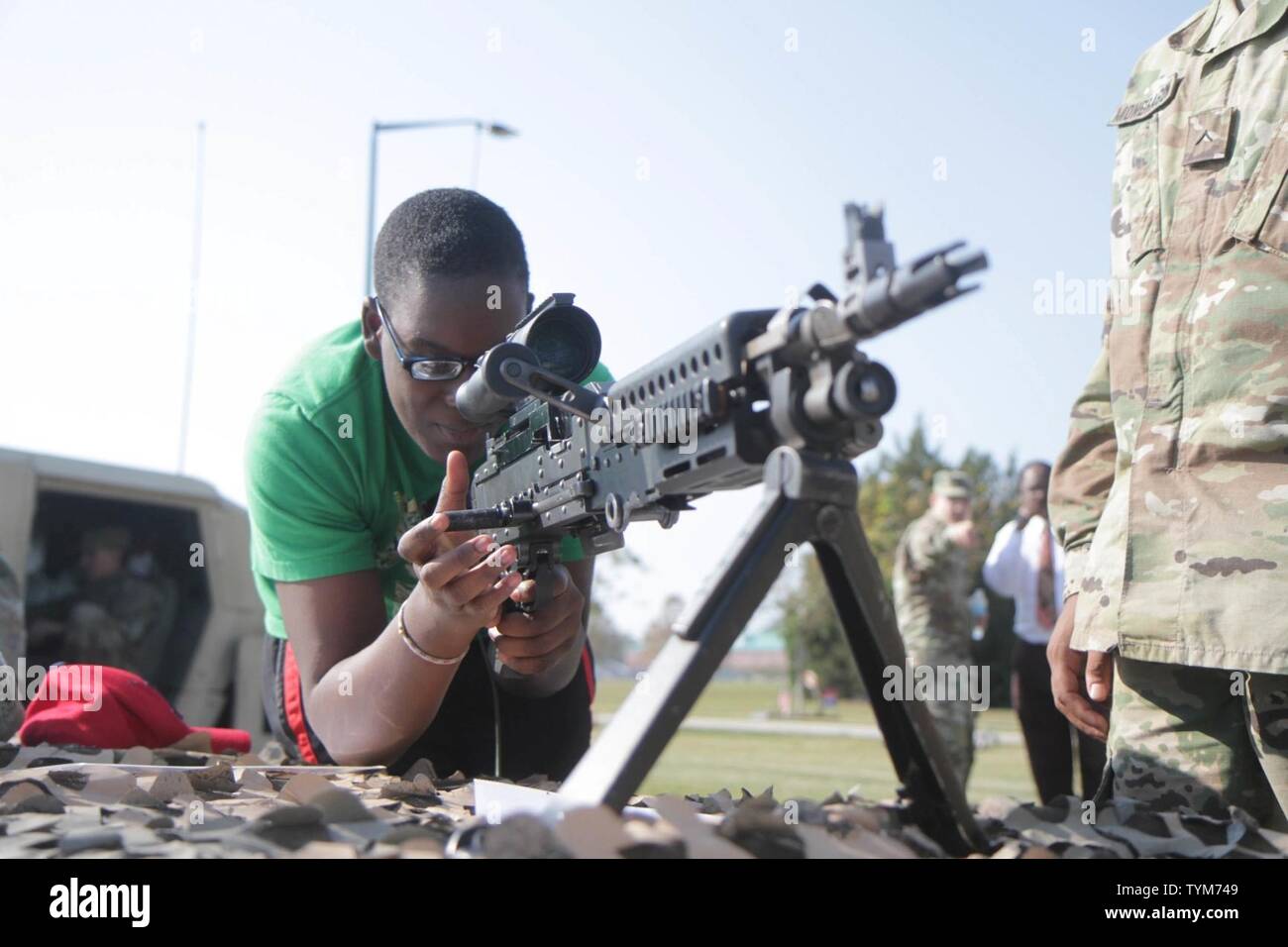 A child explores a 240L weapon system Nov. 16 while at a static display ...