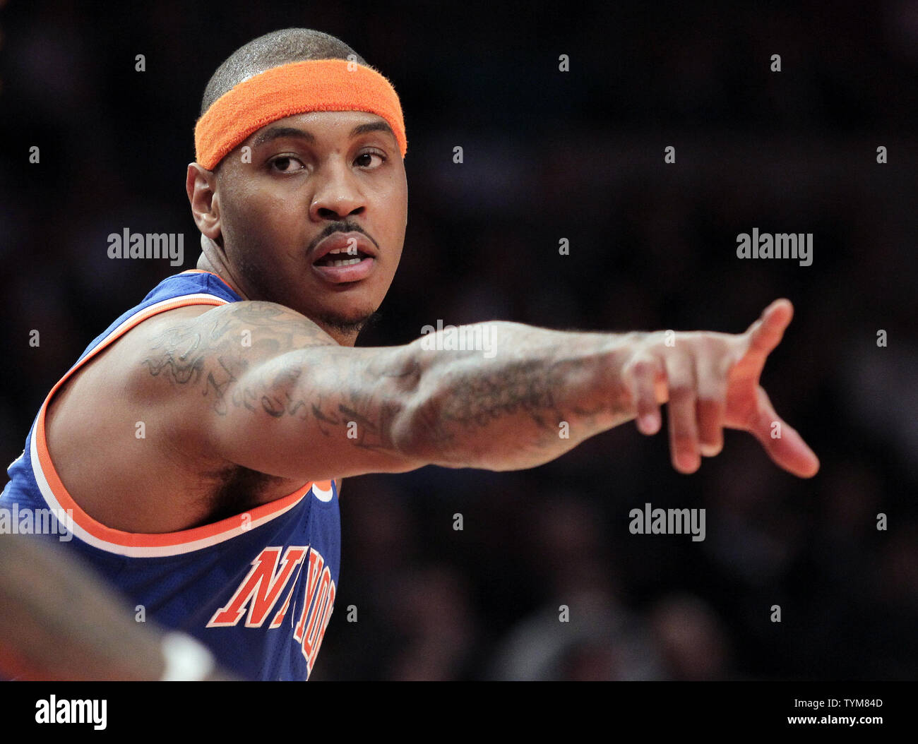 New York Knicks Carmelo Anthony directs his team on defense in the first quarter against the ...