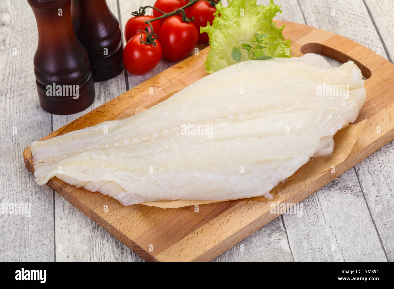 Raw halibut fillet ready for cooking Stock Photo - Alamy