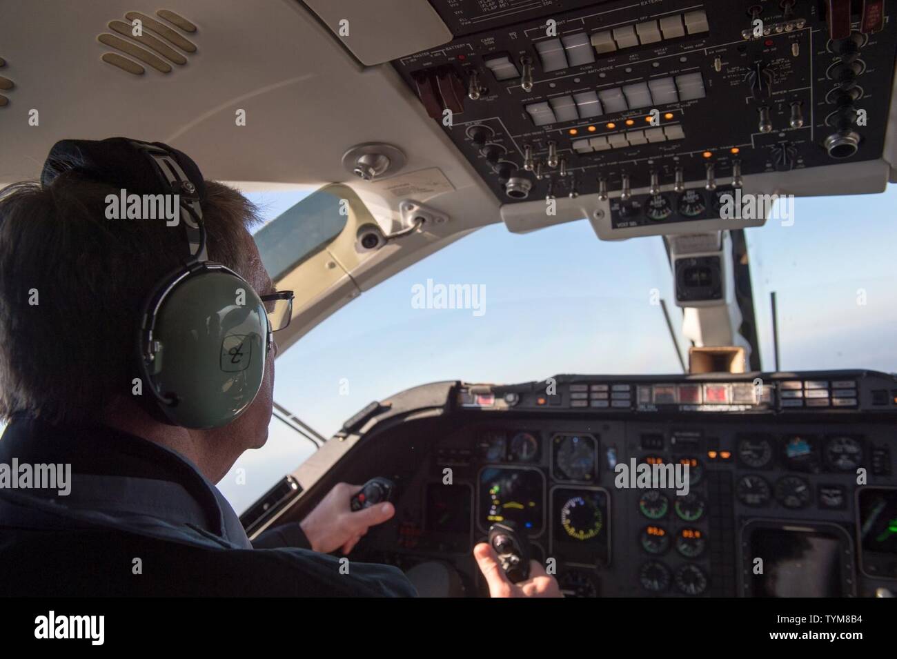 Secretary of Defense Ash Carter pilots a T-1 aircraft during a visit to ...
