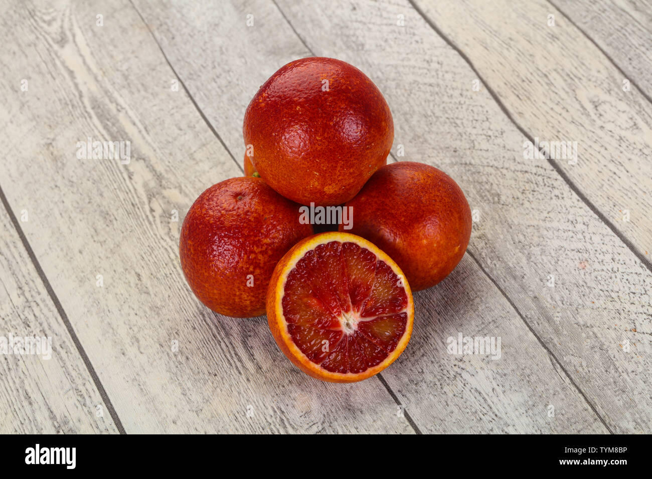 Sweet red orange heap over the table Stock Photo - Alamy