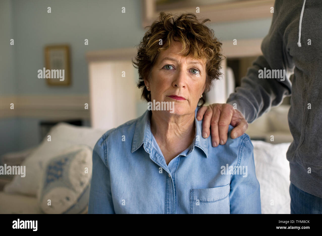 Man looking sad on a bed hi-res stock photography and images - Alamy