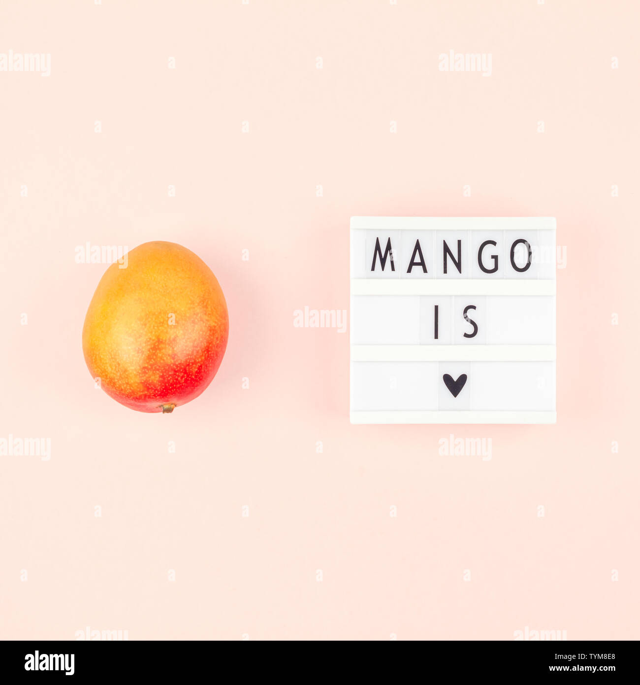 Mango fruit in creative conceptual top view flat lay composition with ...