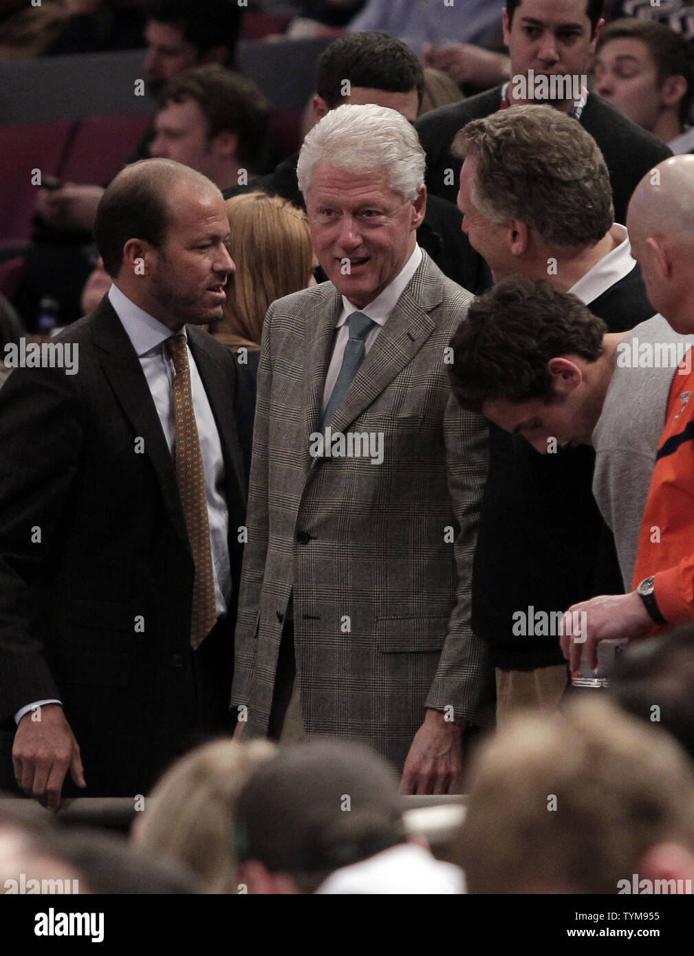 Former President of the United States Bill Clinton watches the ...