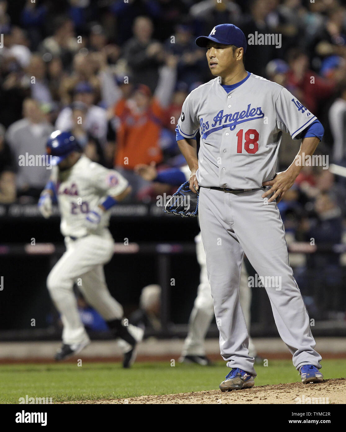 Los Angeles Dodgers starting pitcher Hiroki Kuroda reacts as New York ...