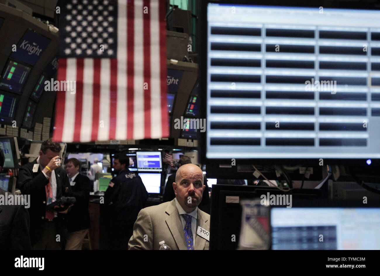 Traders get to work moments after the ringing of the opening bell on ...
