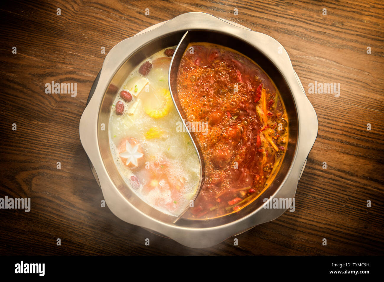 Dolphin bone chicken soup hotpot with Sichuan spicy hotpot Stock Photo ...