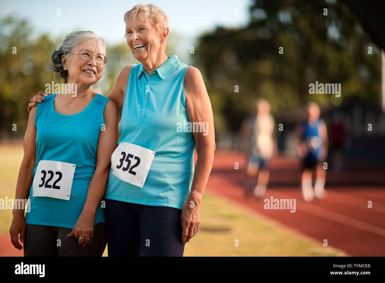 Two happy senior friends after competing in a sports event Stock Photo ...