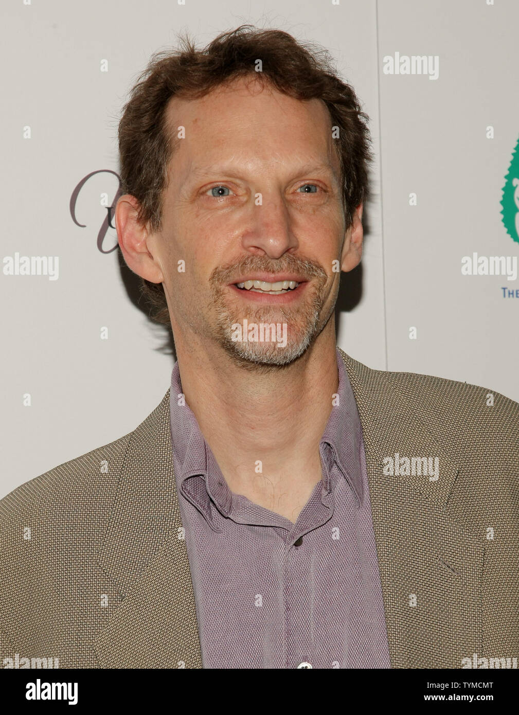 Produce Eric Grunebaum arrives for the premiere of "The Last Mountain ...