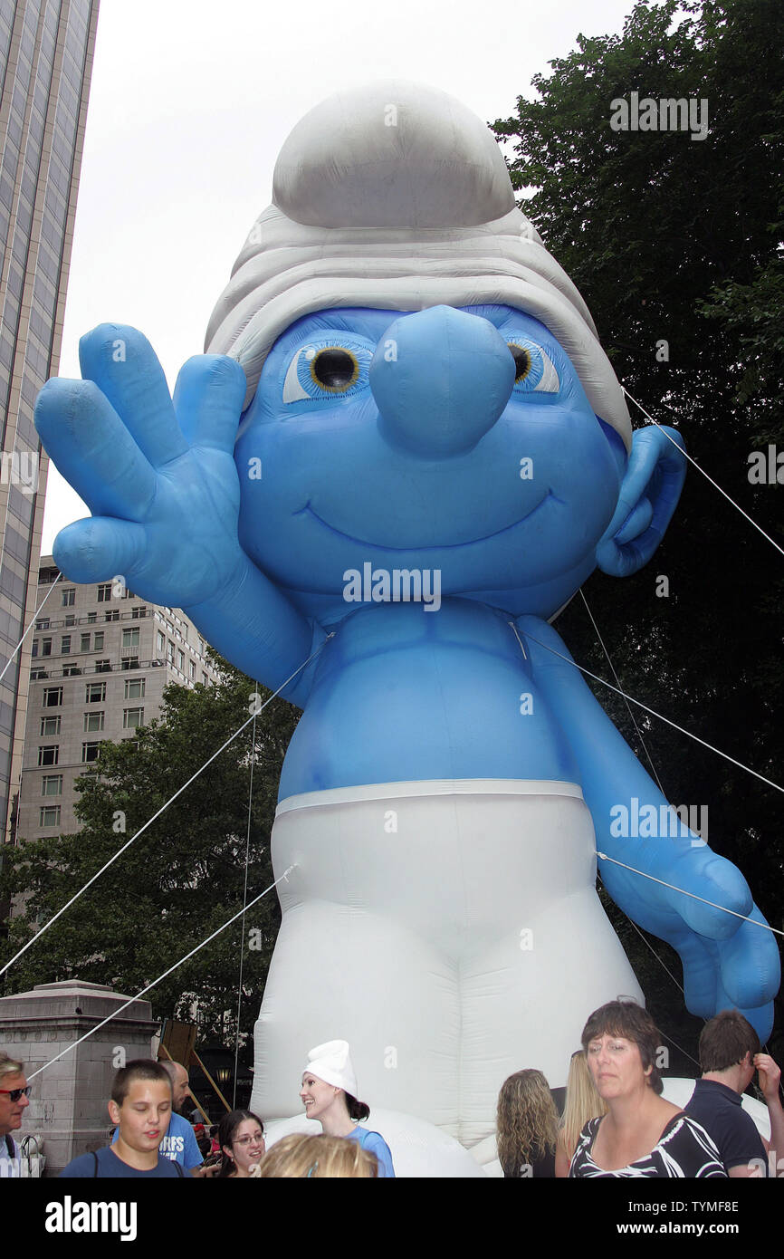 A 40 foot Smurf stands at the entrance of Central Park at the unveiling ...