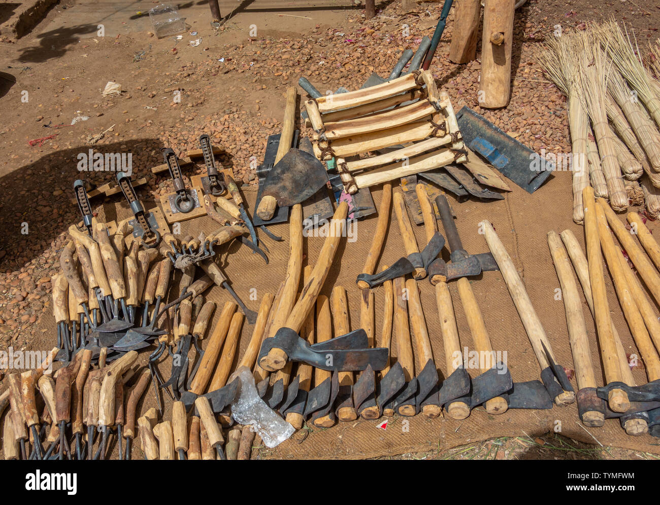 Hammer, sickle, hoe and other tools for field work in a market in Sudan ...