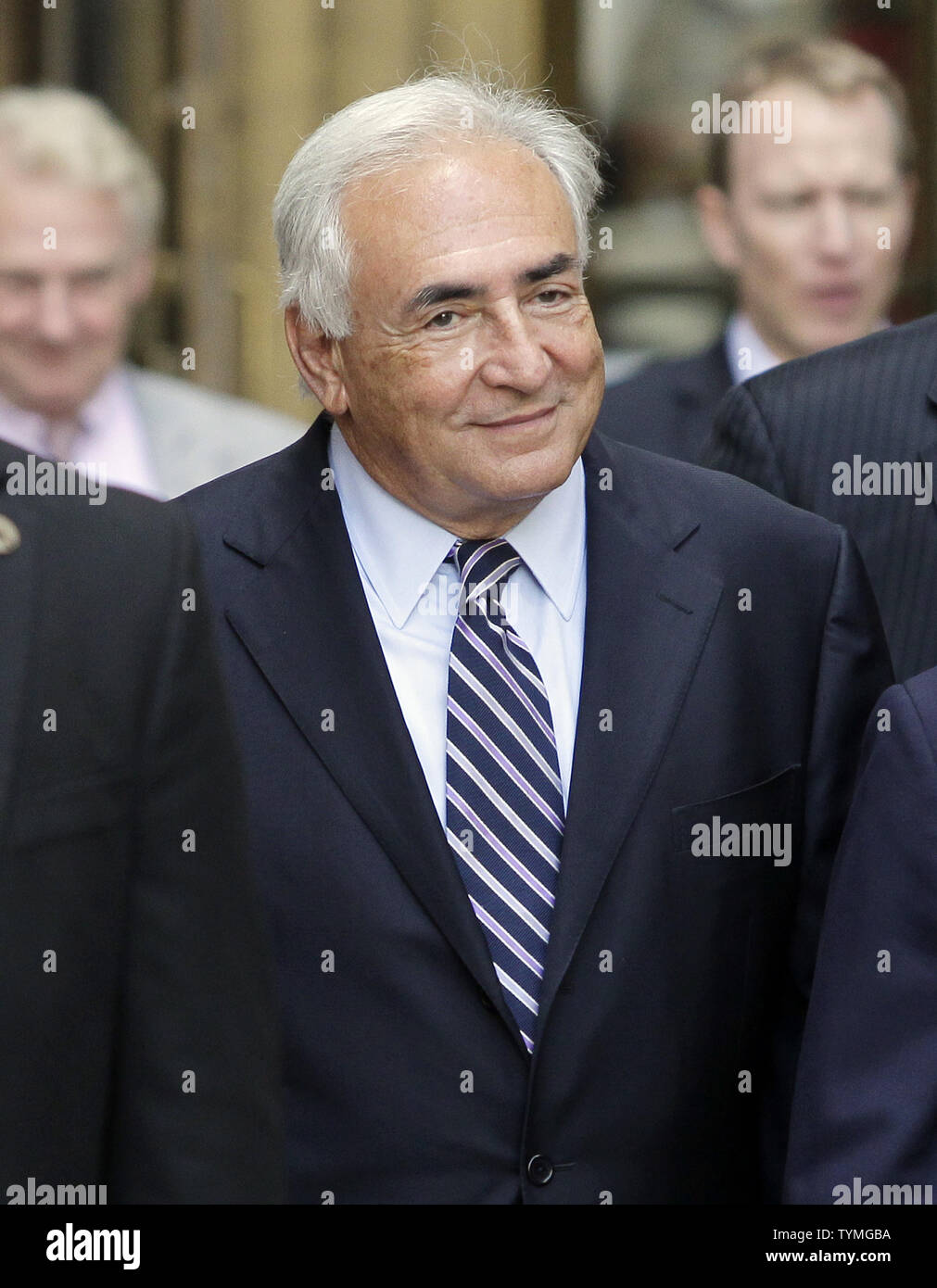 Former International Monetary Fund Chief Dominique Strauss-Kahn walks ...