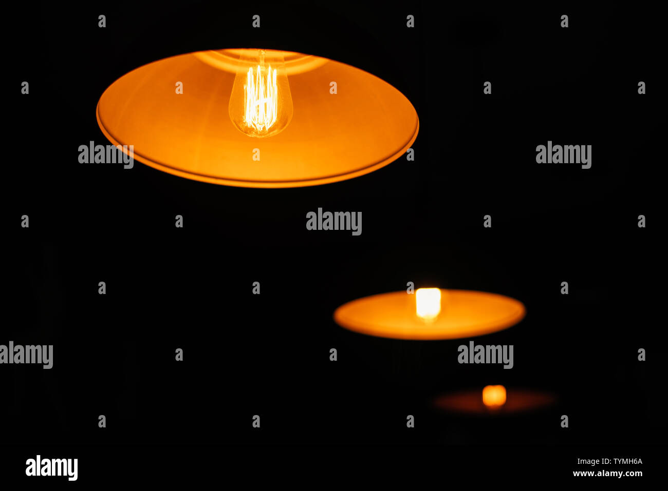 Vintage light bulb in black room hi-res stock photography and images ...