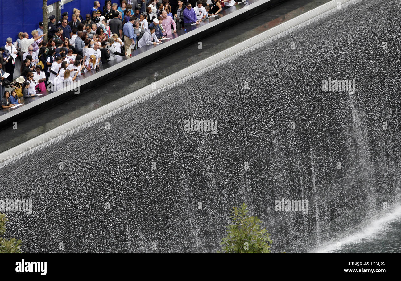 Loved ones of the Victims of 9/11stand at the Memorial Pools on the ...