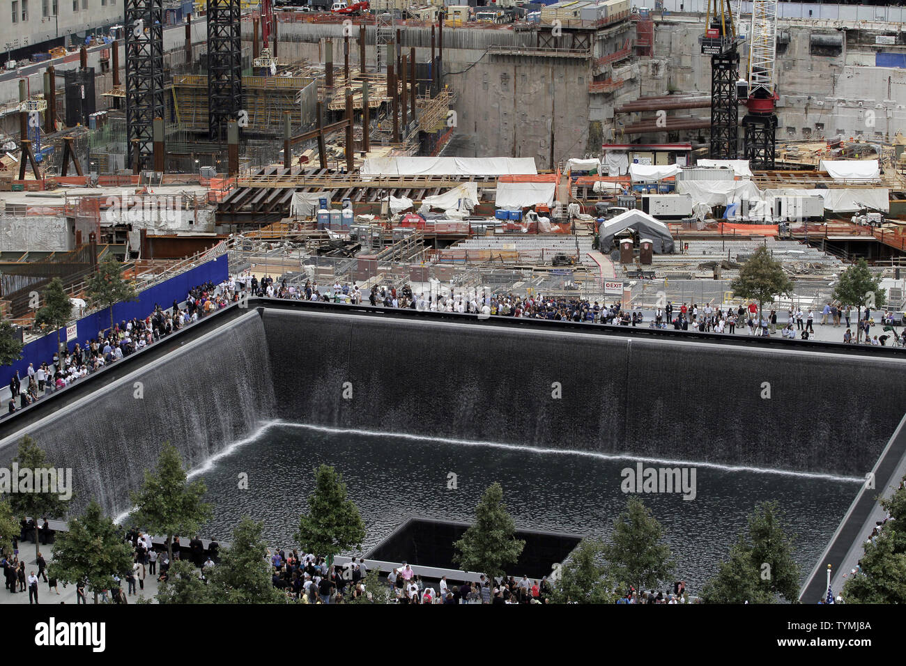 Loved ones of the Victims of 9/11stand at the Memorial Pools on the ...