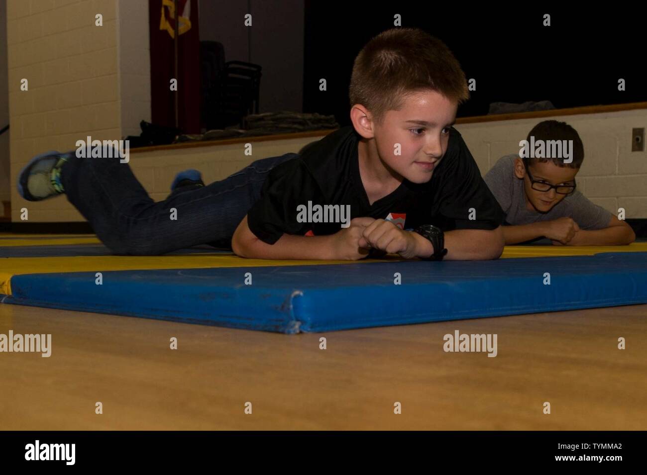 Devyn West, age eight, General Stanford Elementary student, Army crawls ...