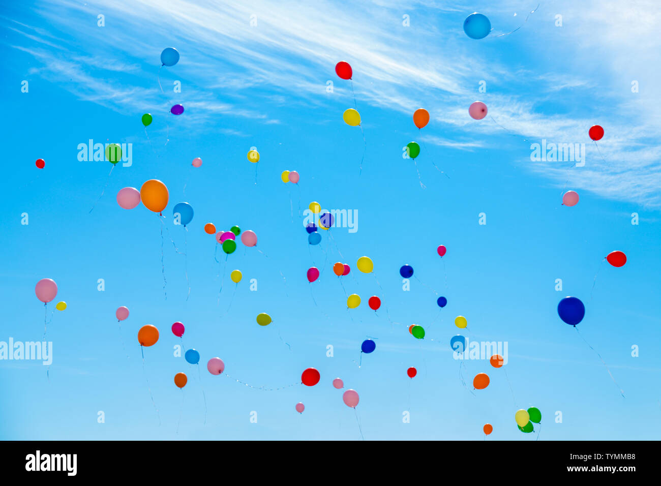 Festive balloons flying in sky hi-res stock photography and images - Alamy