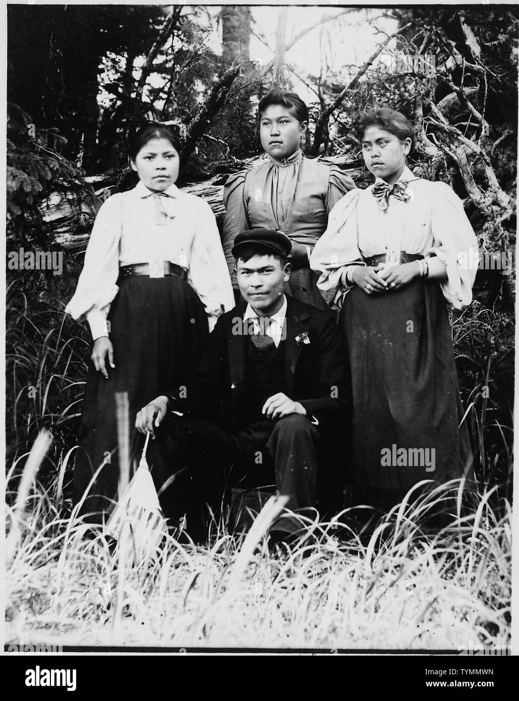Three women and one man Black and White Stock Photos & Images - Alamy