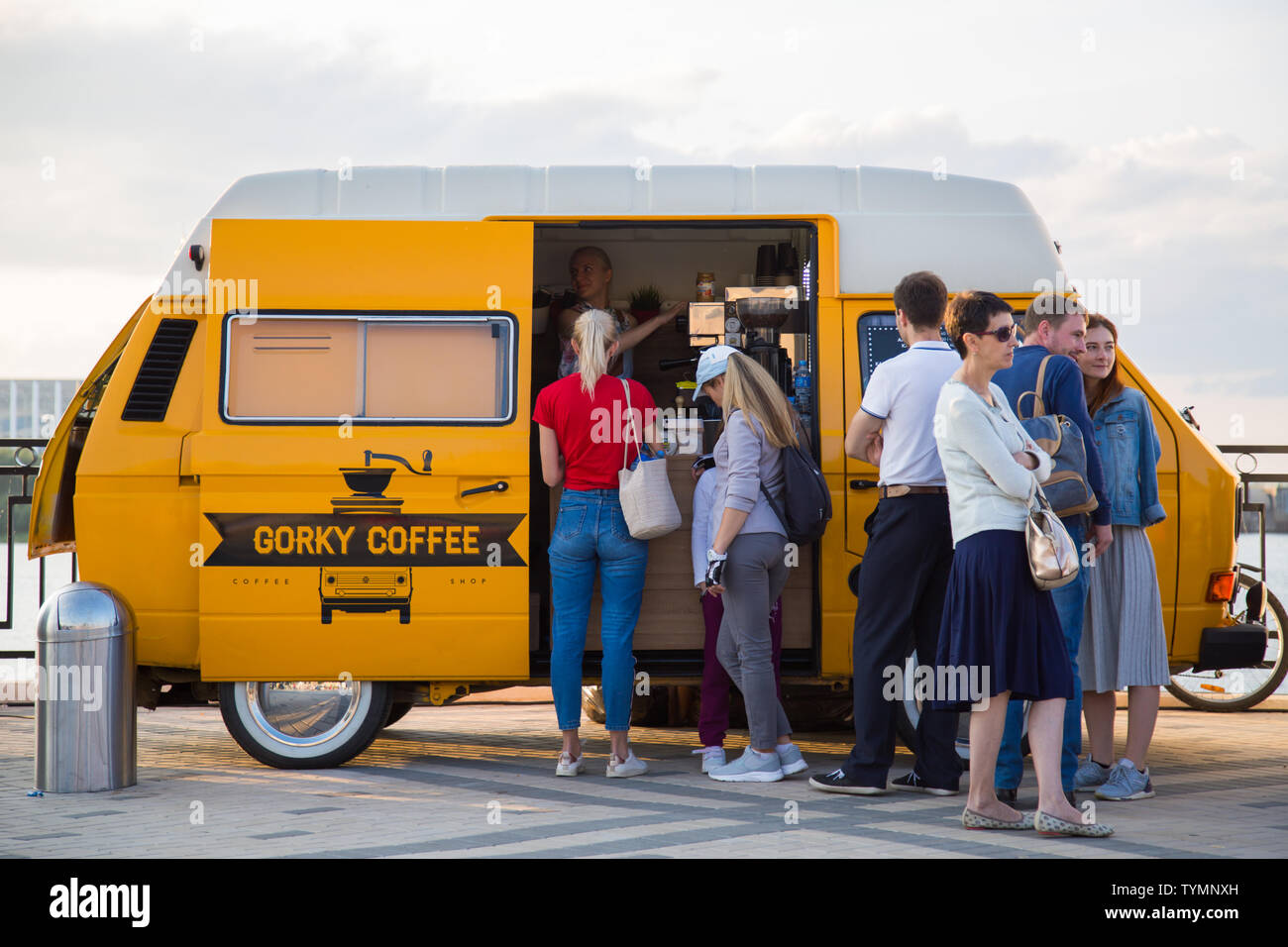 Food trucks on embankment Stock Photo - Alamy