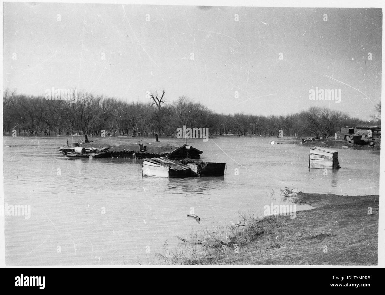 Tops of buildings show above spring floodwaters Stock Photo - Alamy