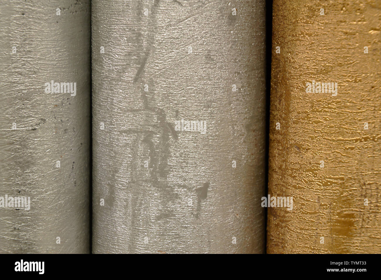 Silver and gold candles surface texture background Stock Photo - Alamy