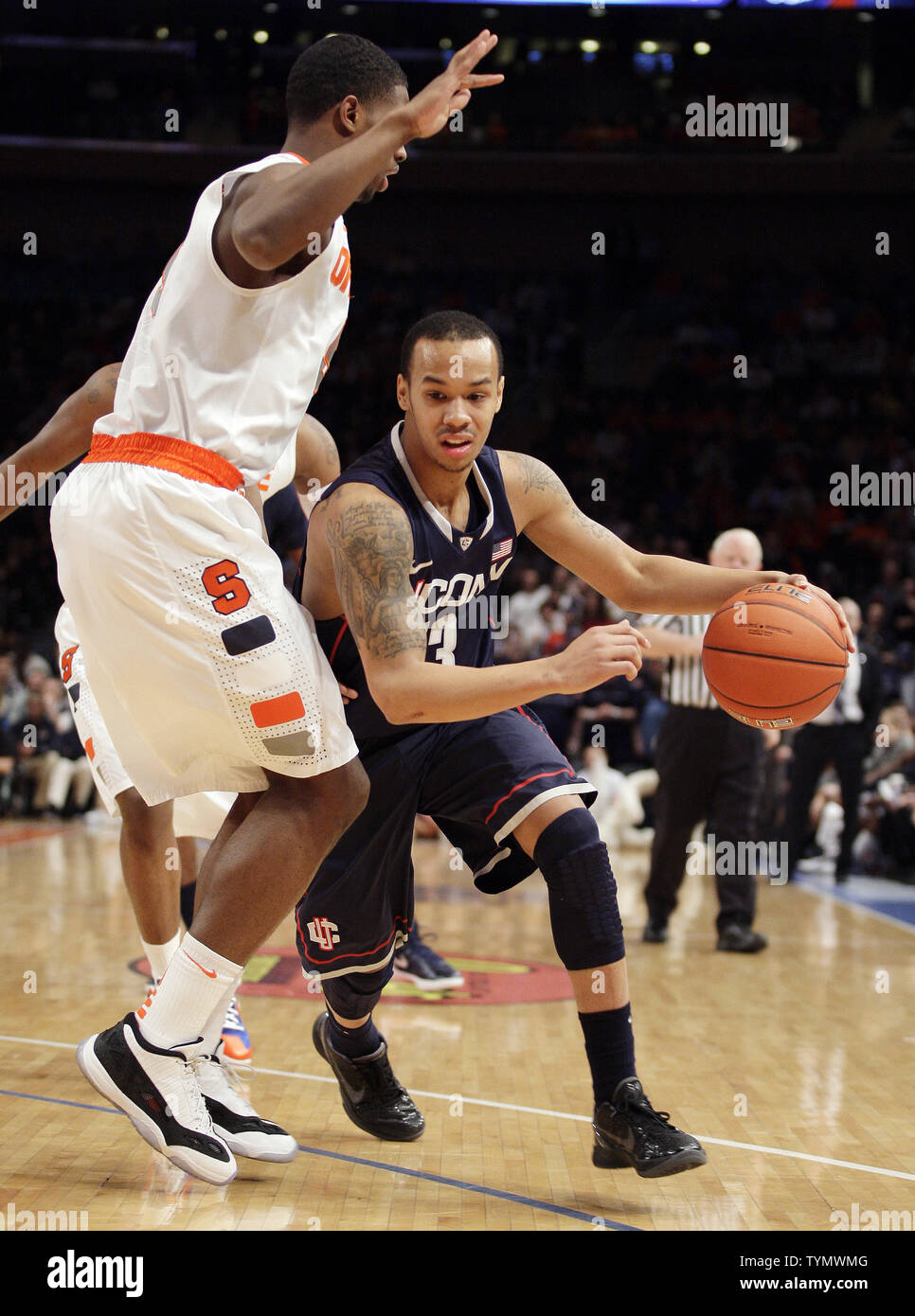 Syracuse Orange C.J. Fair defends Connecticut Huskies Shabazz Napier in ...