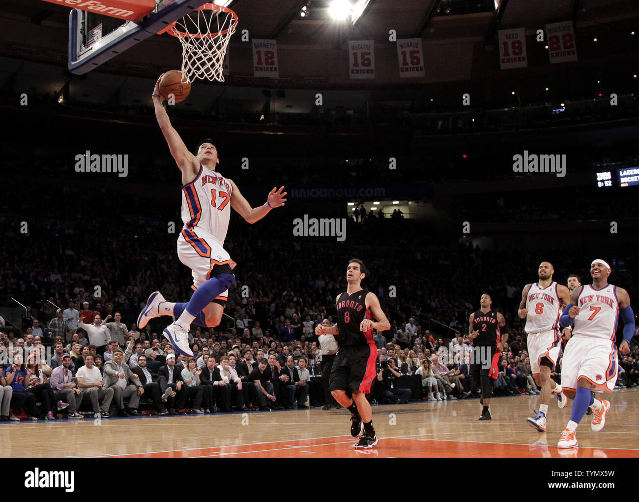 New York Knicks Carmelo Anthony and Tyson Chandler watch Jeremy Lin ...