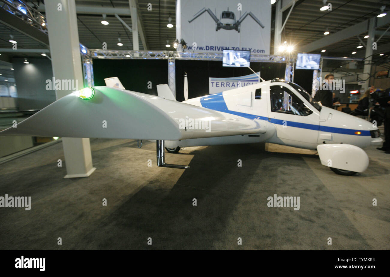 The Terrafugia flying car is seen with its wings unfolded as it is ...