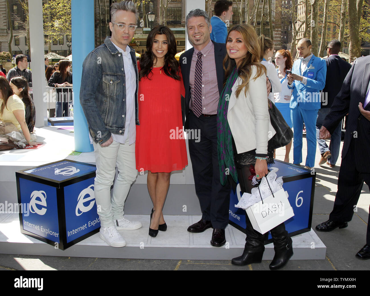 Kourtney Kardashian and her entourage pose for pictures as she promotes ...