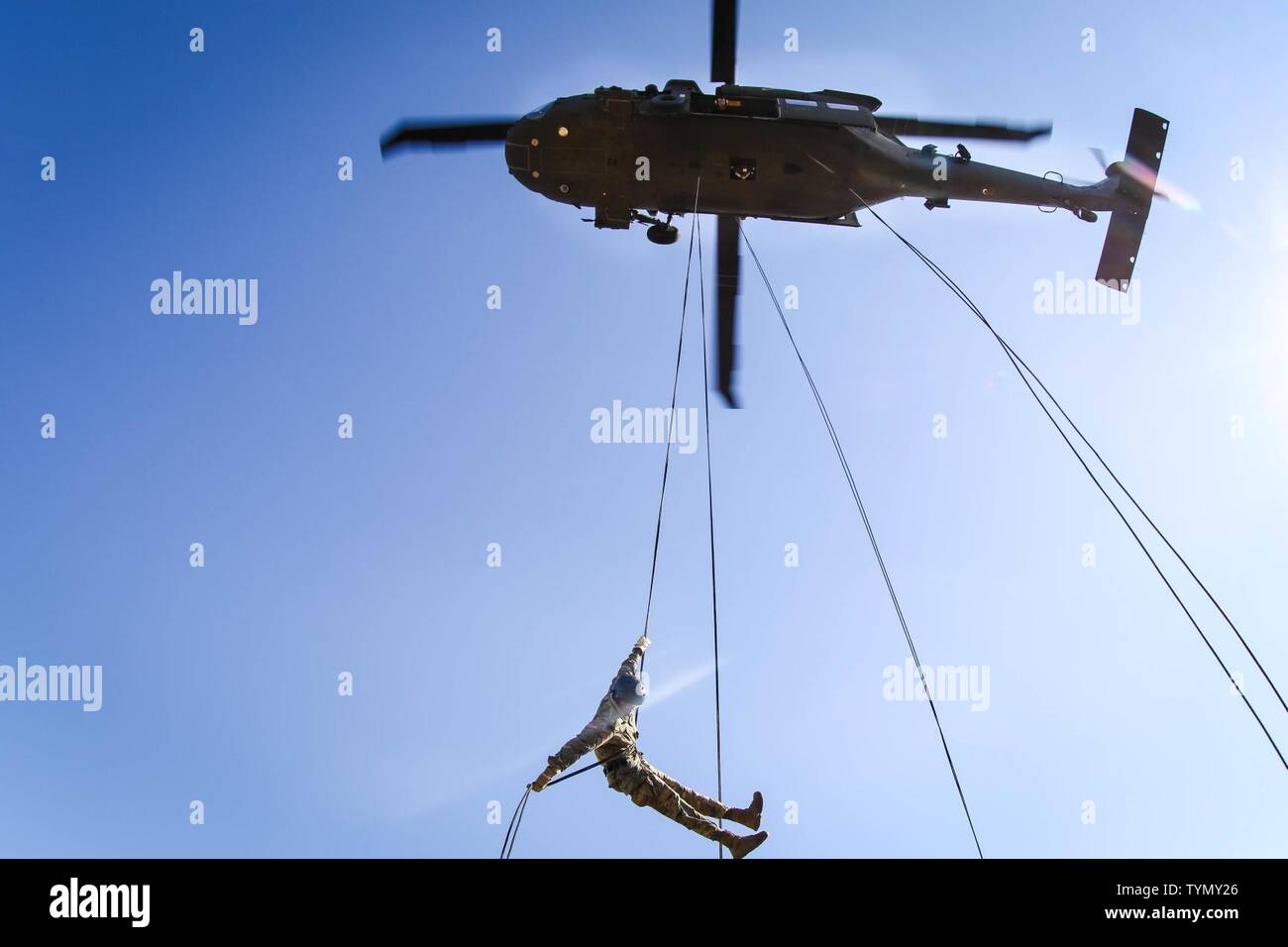 An instructor from the DeGlooper Air Assault School, XVIII Airborne ...