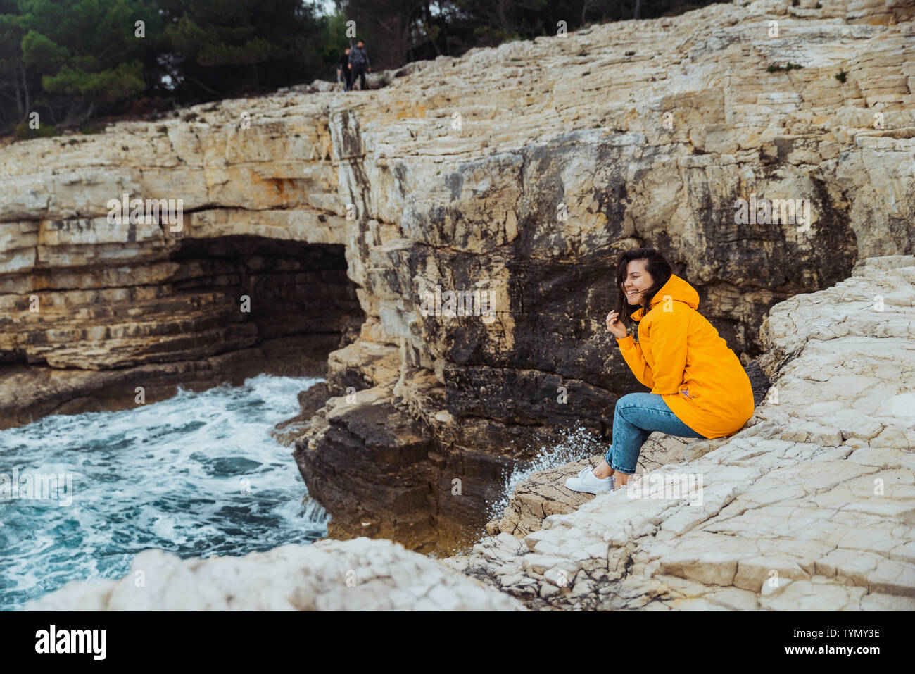 Person siting on beach hi-res stock photography and images - Alamy