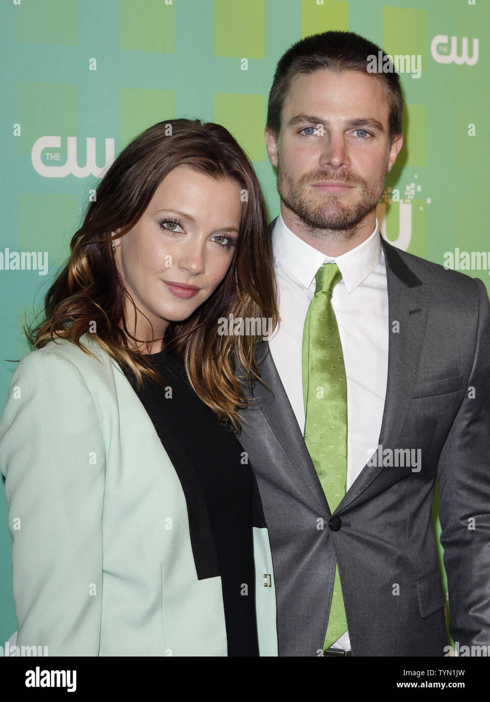 Katie Cassidy and Stephen Amell arrive at the CW Upfronts at the London ...