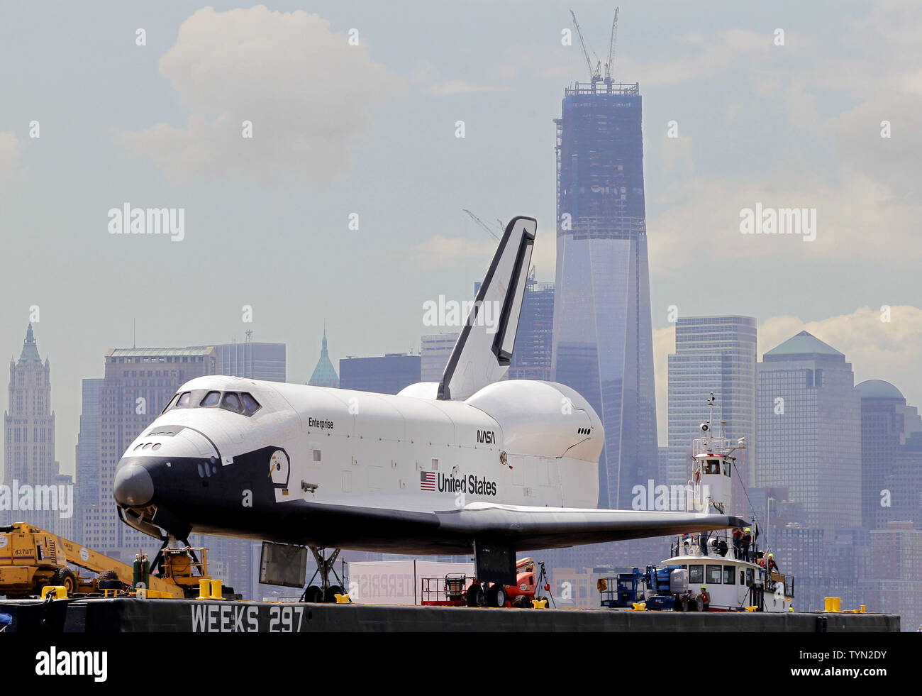 The Space Shuttle Enterprise floats on a barge on the Hudson River ...