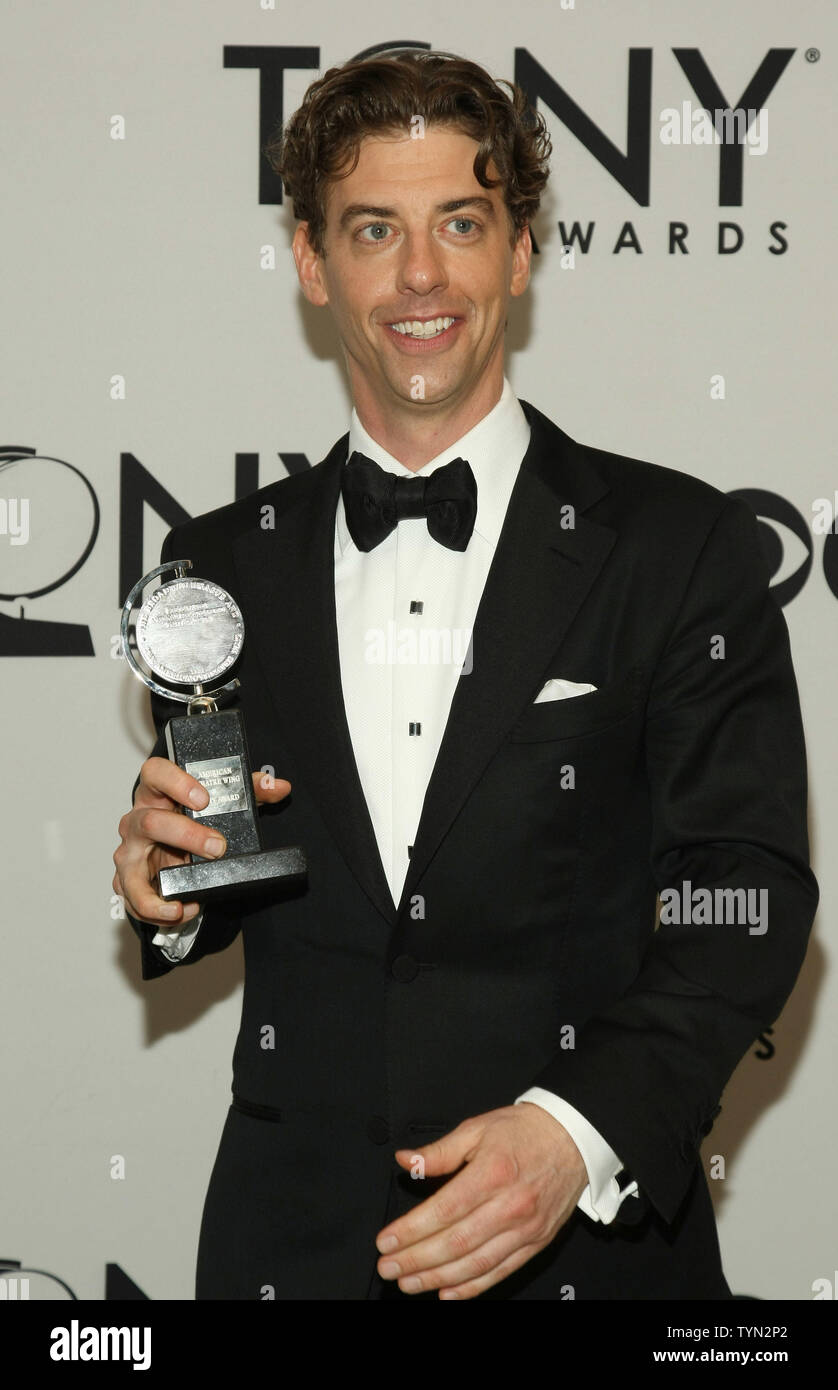Christian Borle poses for photographers after winning the 2012 Tony ...