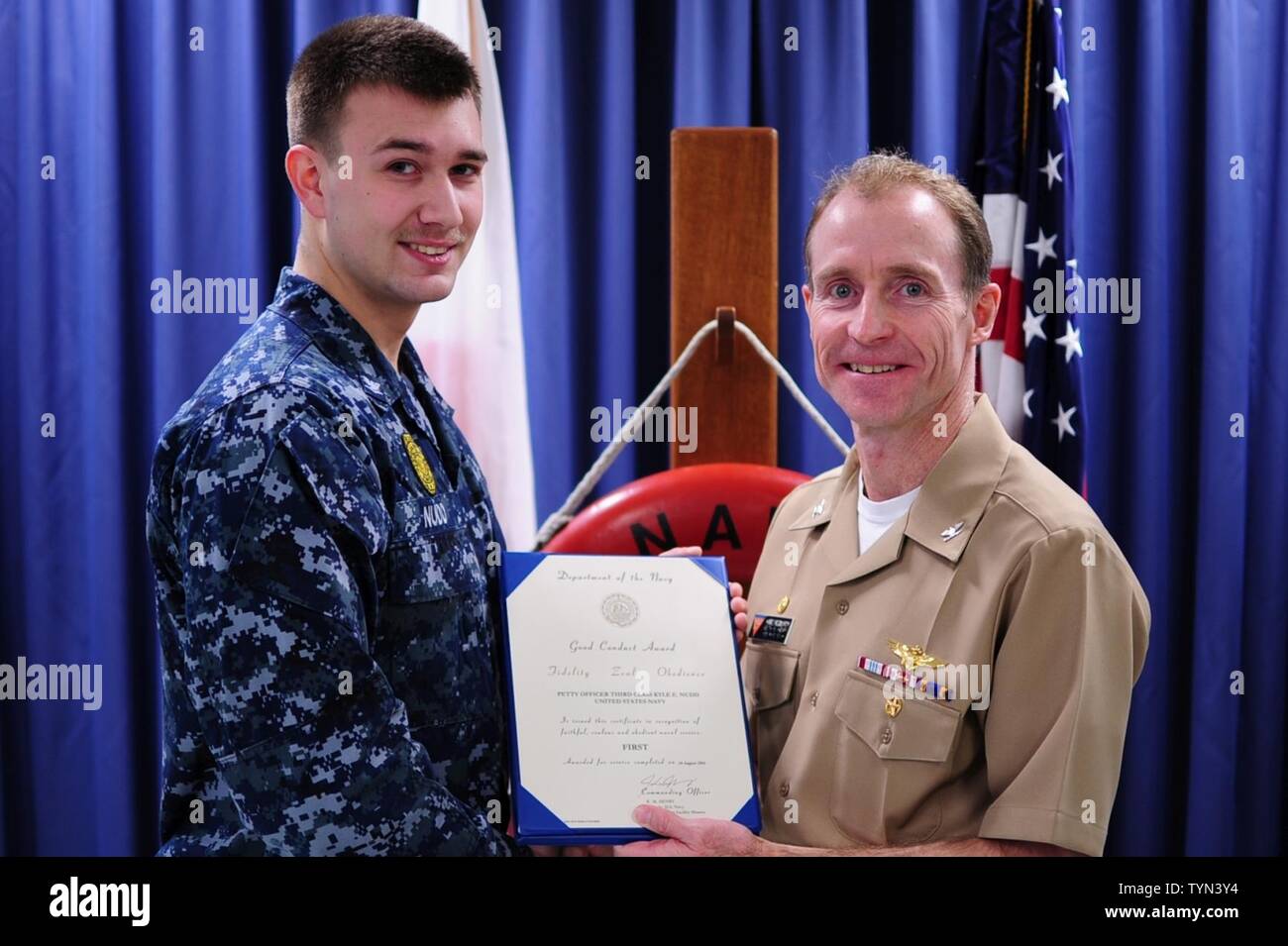 Department of the navy good conduct award hi-res stock photography and ...
