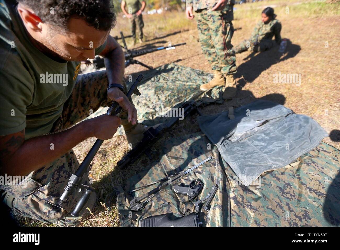 Petty Officer Second Class Matthew Foreman races to complete the ...