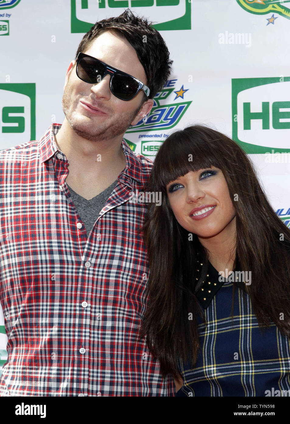 Adam Young and Carly Rae Jepsen arrive for photos at Arthur Ashe Kids ...