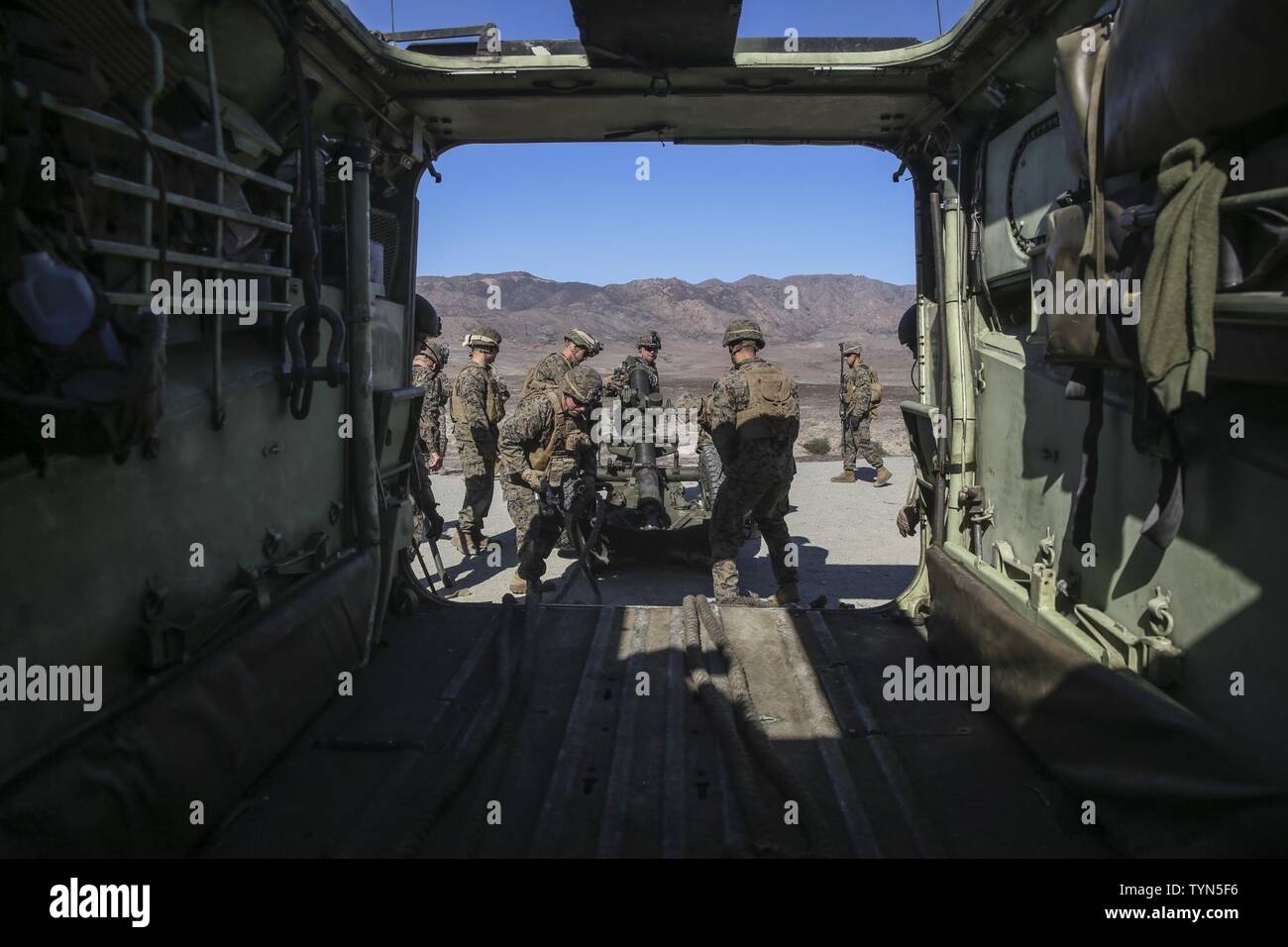 Marines with Battery B, 1st Battalion, 11th Marine Regiment, prepare an ...