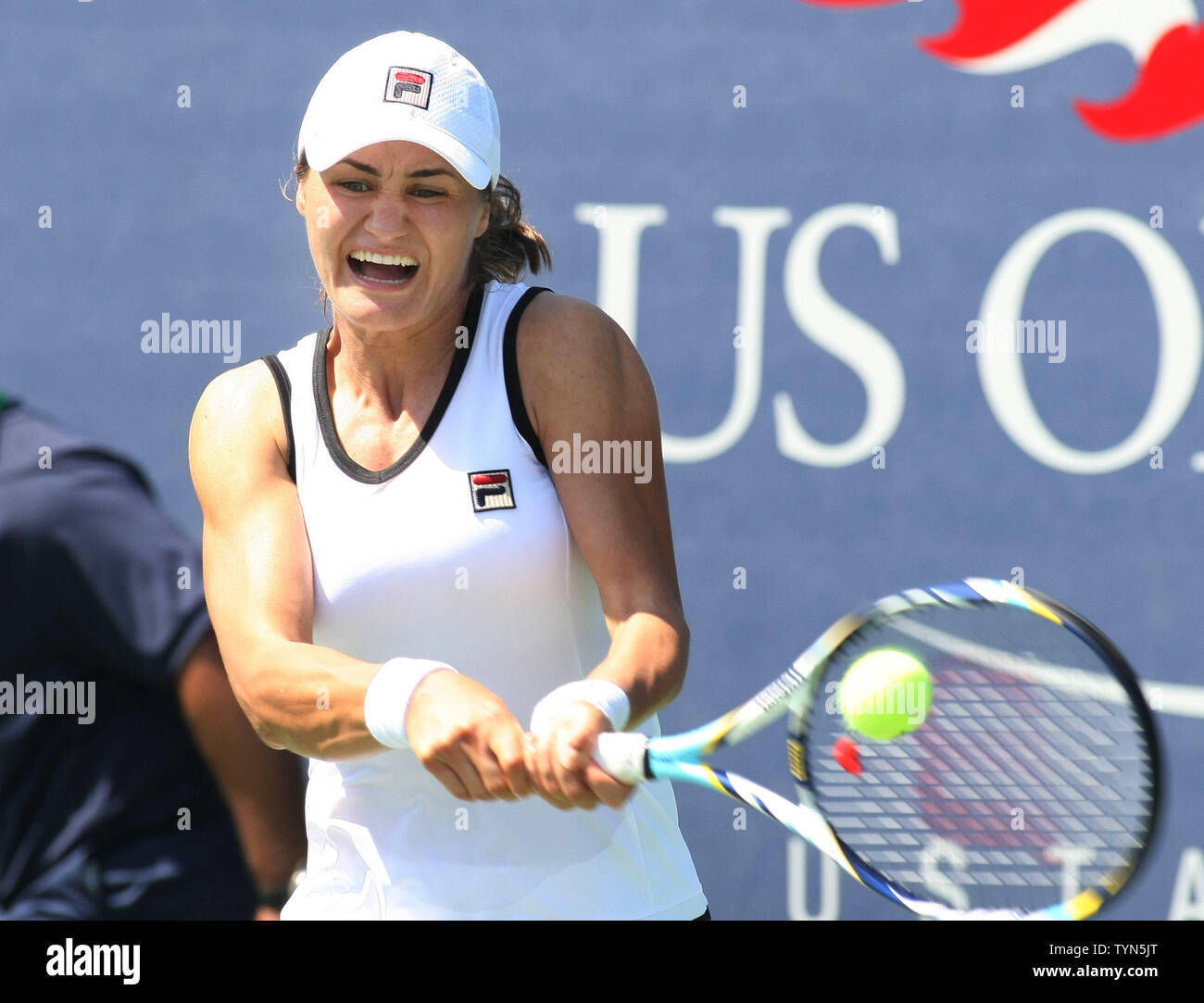 Monica Niculescu of Romania returns the ball to Ayumi Morita of Japan ...