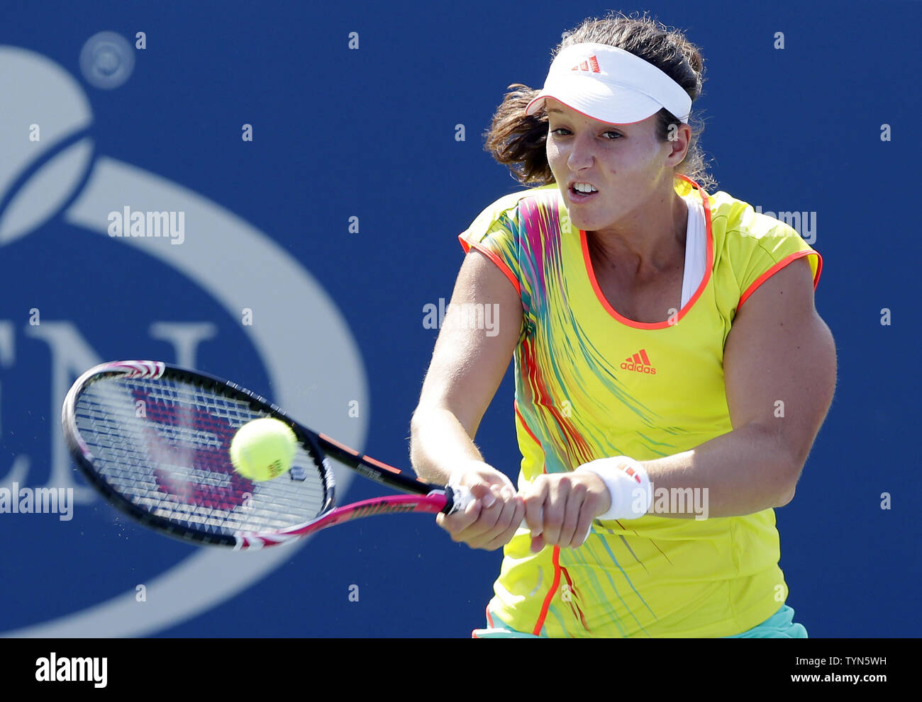 Laura Robson of Great Britain hits a backhand to Na Li of China in a ...