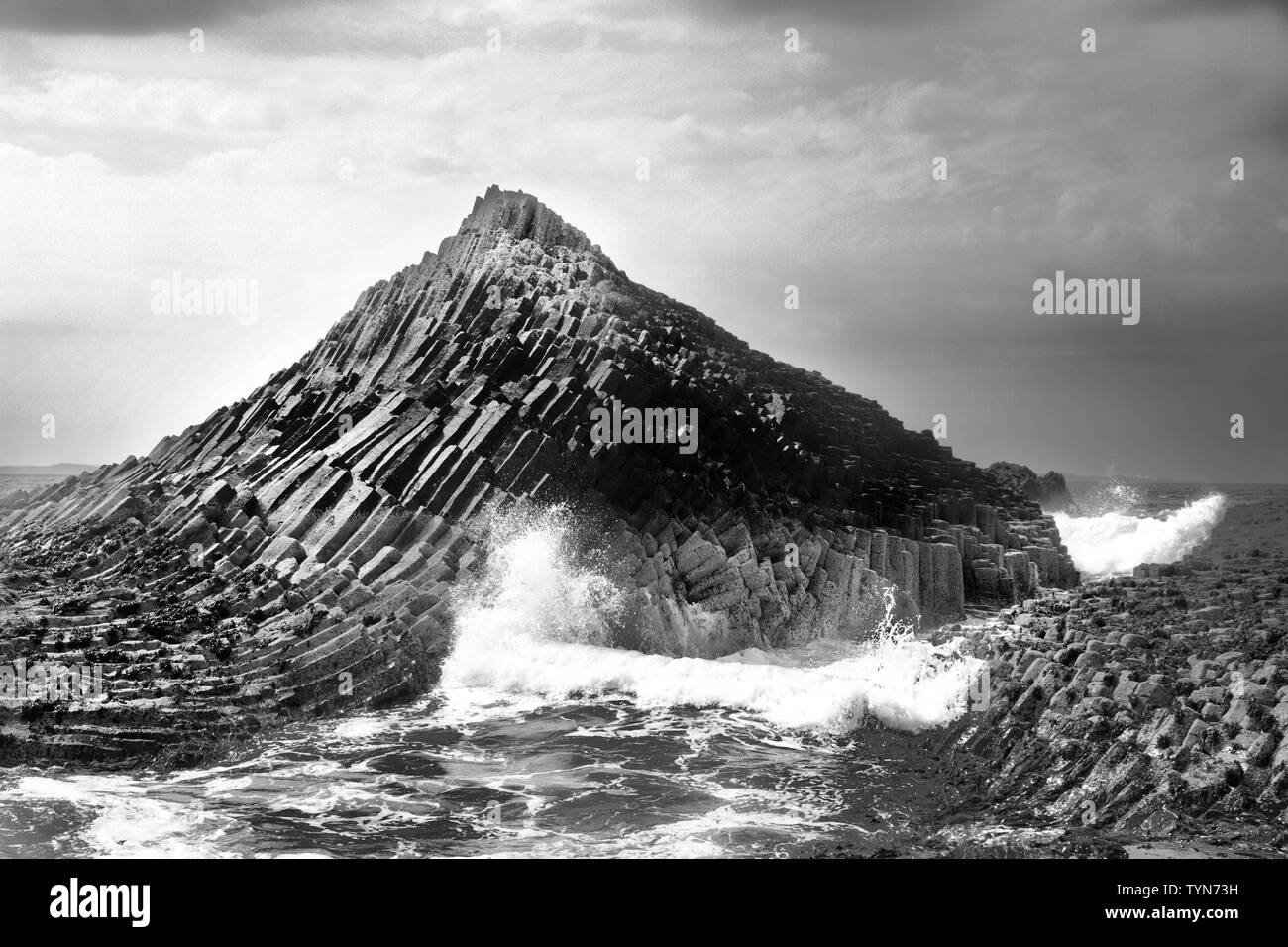Contorted basalt columns on the Isle of Staffa near landing jetty ...