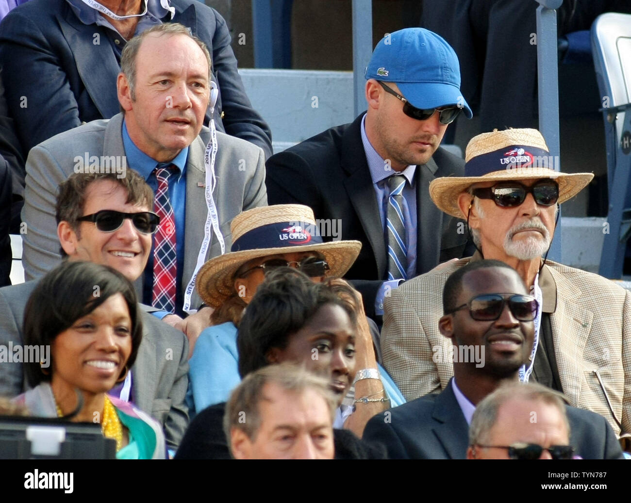 Actors Kevin Spacey, top left, and Sean Connery (R) watch Andy Murray ...