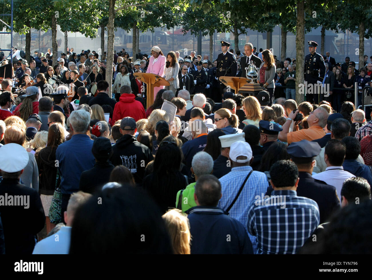 Family members gather as the names of the victims of the World Trade ...