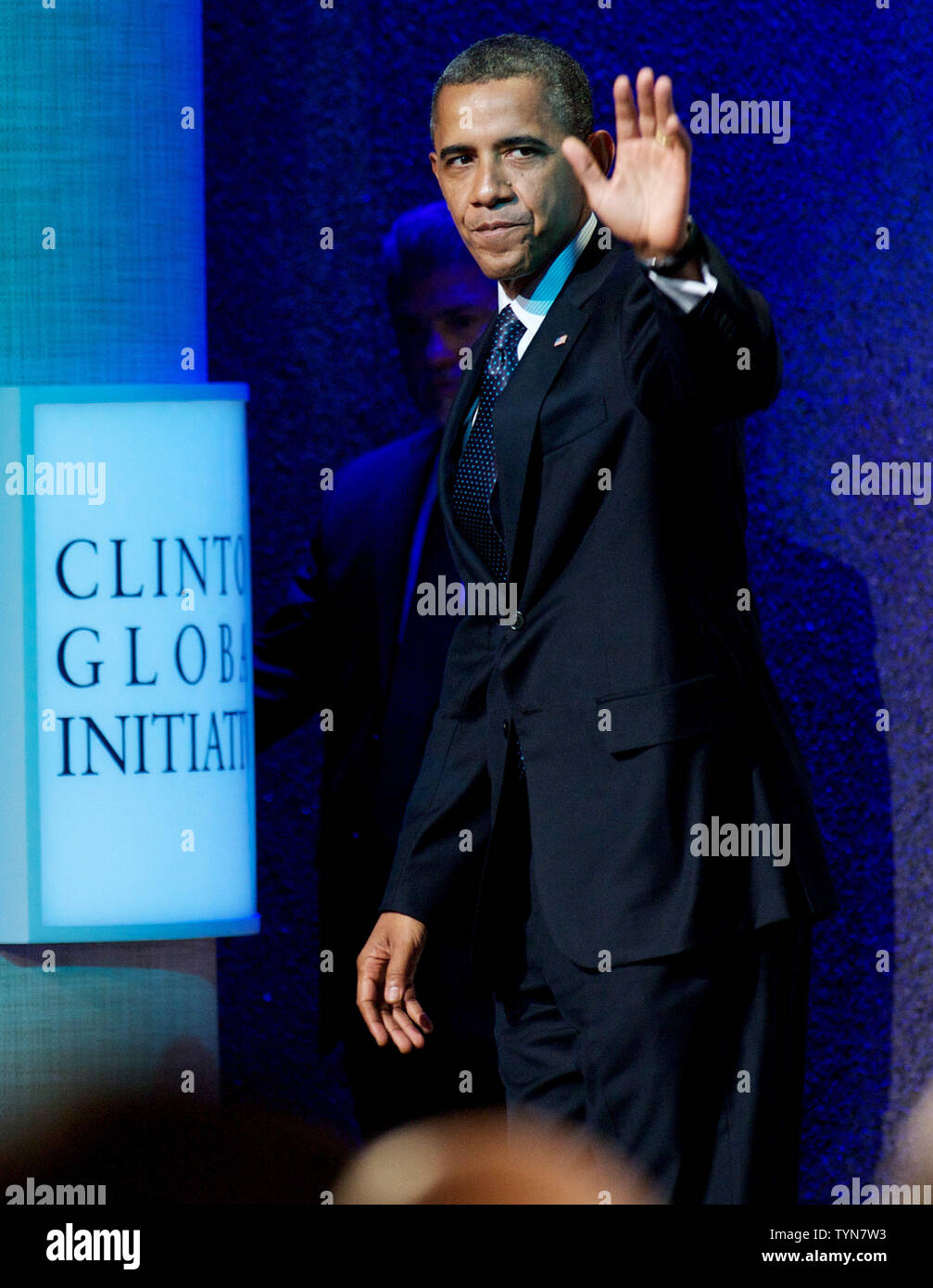 President Barack Obama waves to the audience after speaking at the 2012 ...